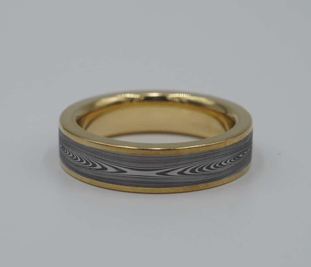 Chris Ploof | Infinity Damascus Ring | Artfully Elegant — Handmade Jewelry & Handcrafted Gifts
